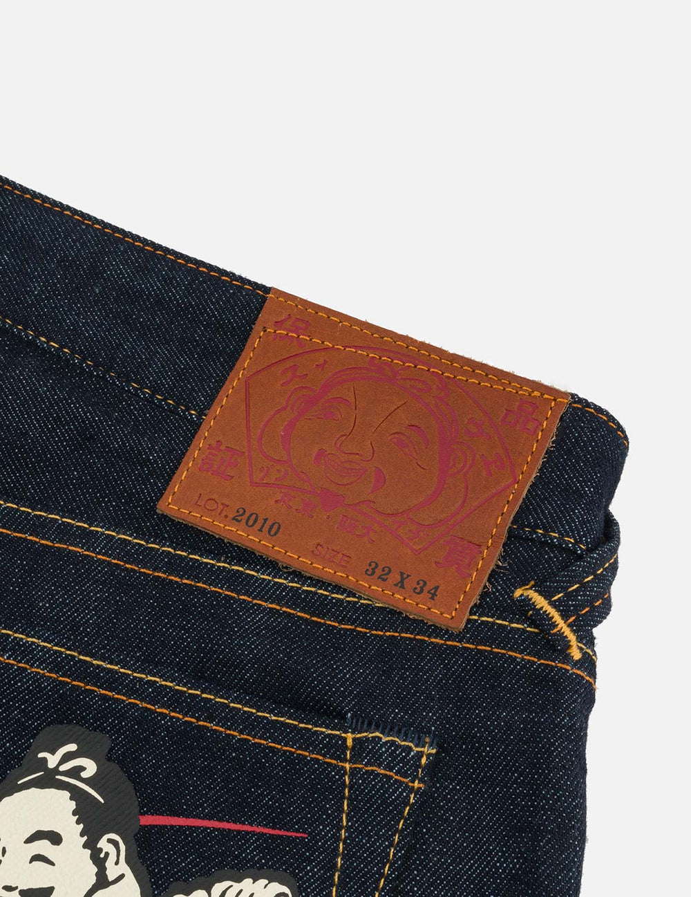 仏頭ゴルフプリント スリムフィットジーンズ #2010 – EVISU